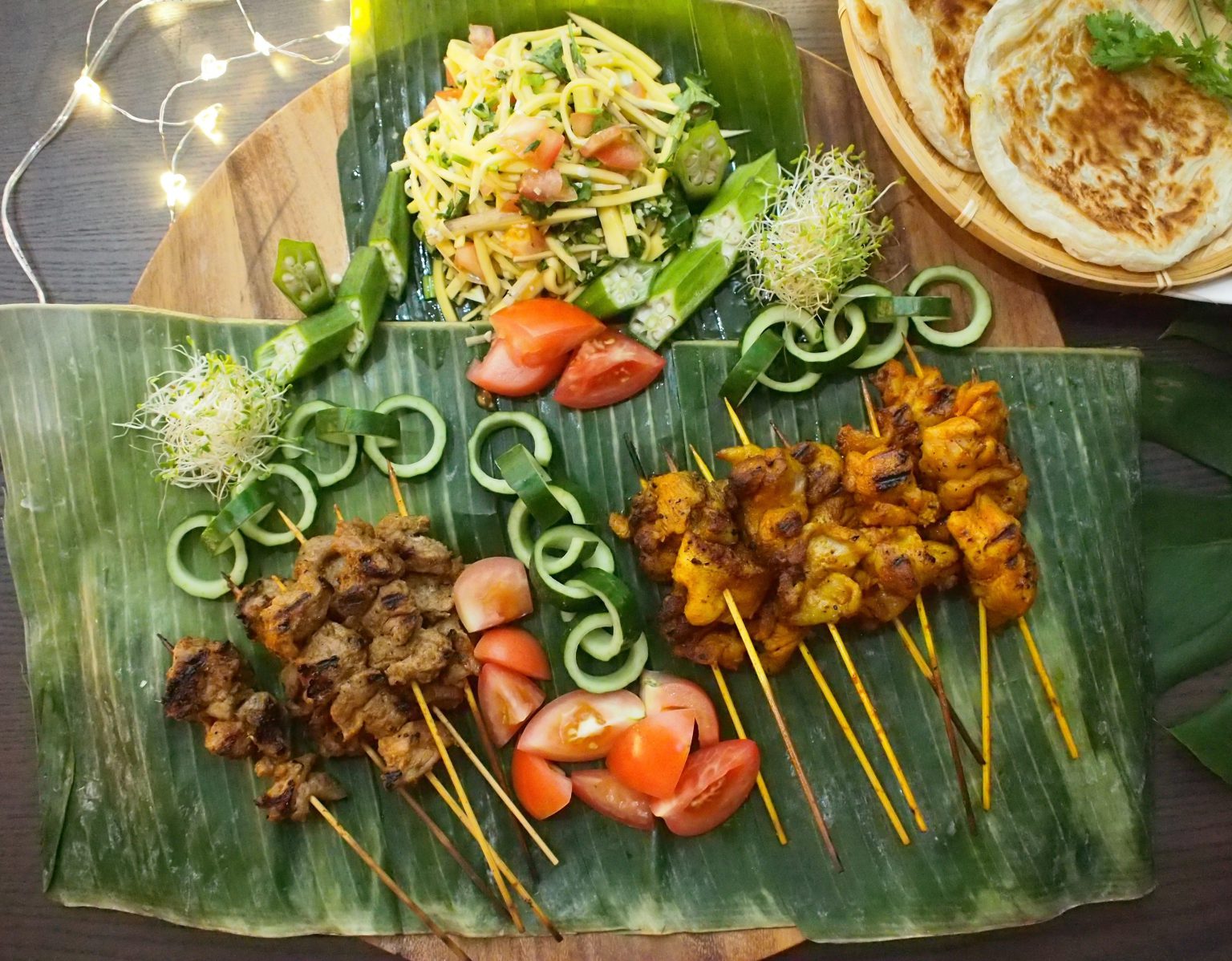 Southeast Asian Platter -Pork & Chicken Satay, Lamb Curry, Yam Som Tam ...